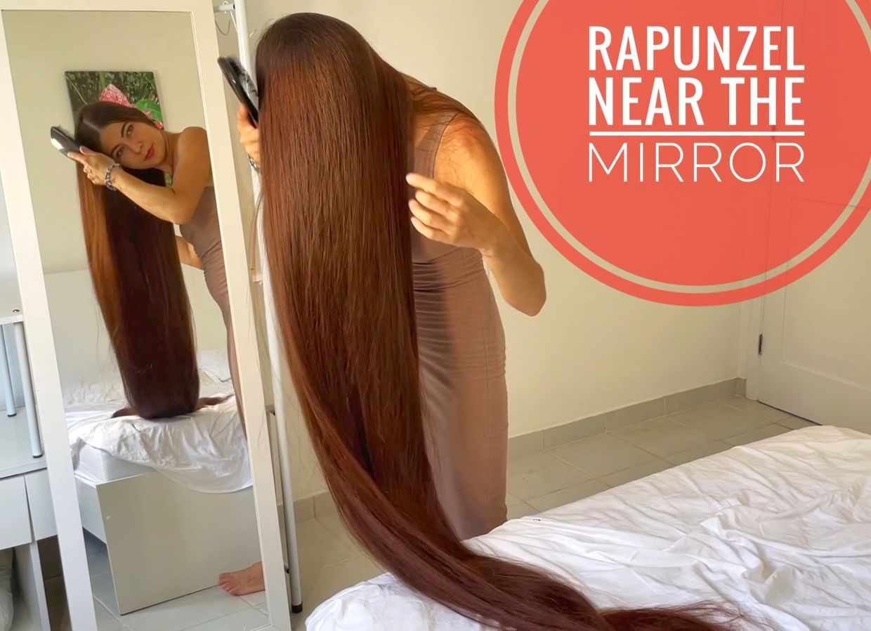 Real-life Rapunzel near the mirror