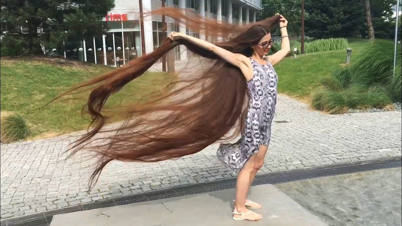 Hair play on a very large glass table