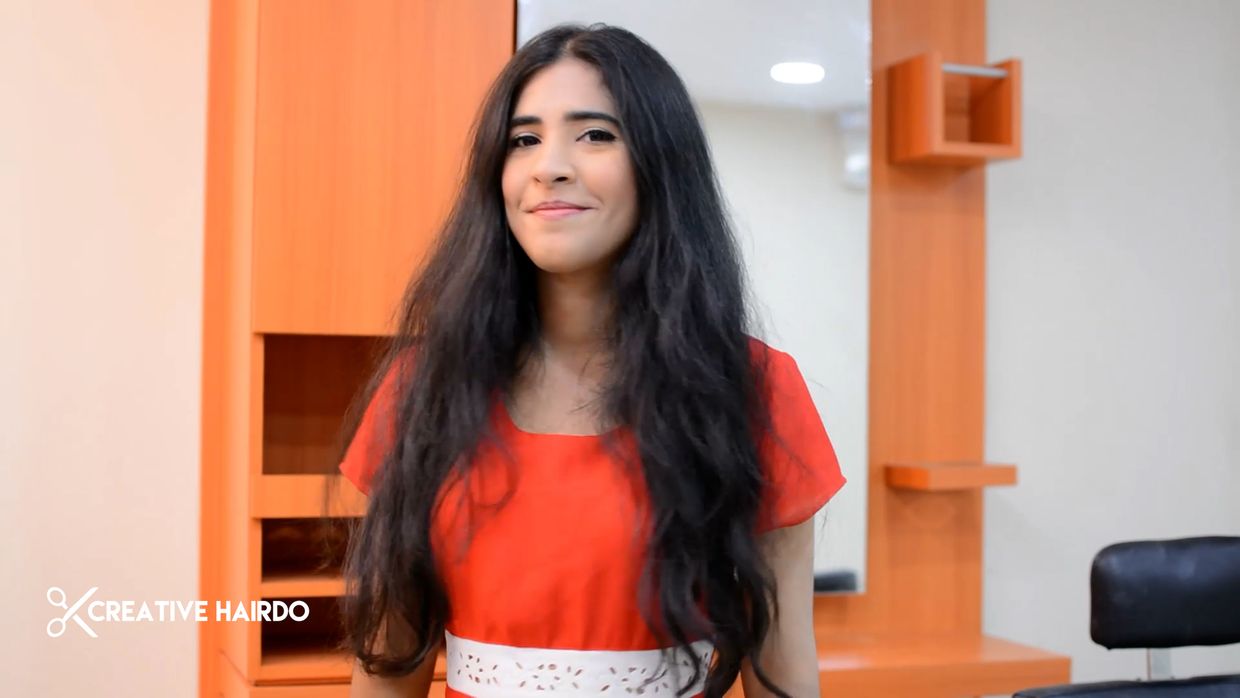 Maria Garcia "Long to short hair with curly ends"